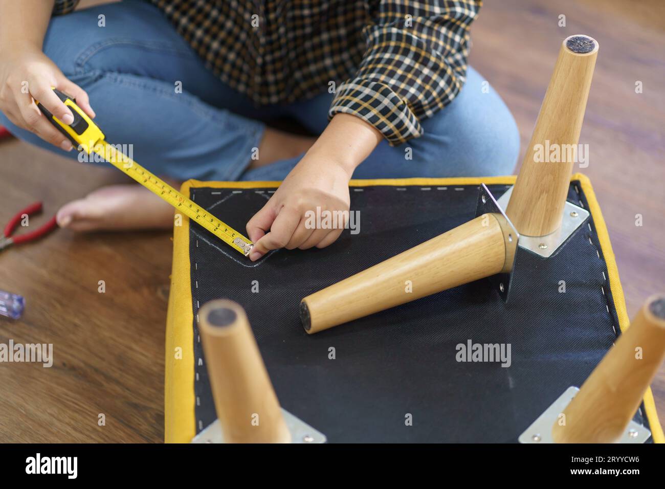 Asian Woman self repairs furniture renovation using equipment to diy ...