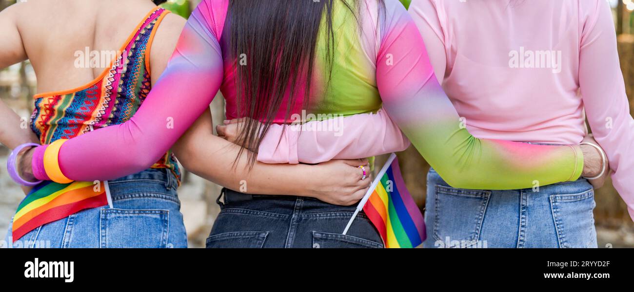 Happy friends LGBTQ transgender Asian woman LGBTQIA holding each other ...