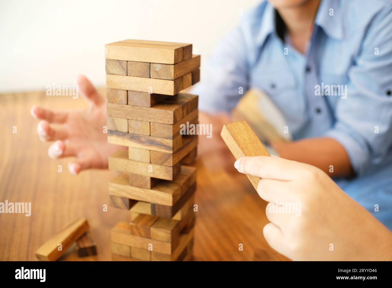 Playing together blocks hi-res stock photography and images - Alamy