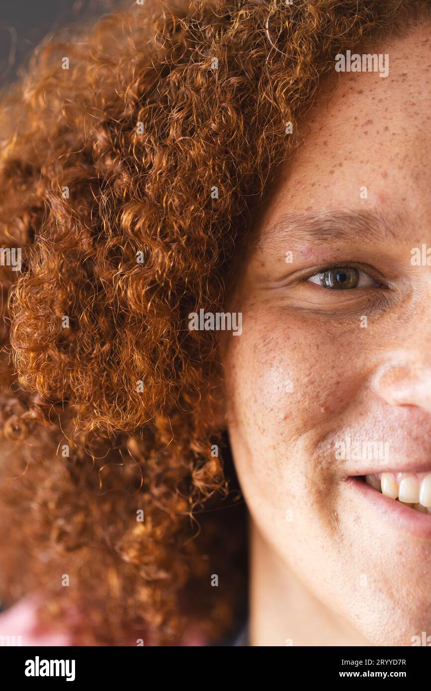 Half face smiling biracial young hi-res stock photography and images - Alamy