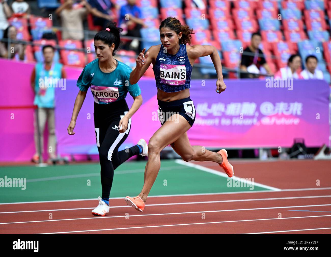 Hangzhou, China's Zhejiang Province. 3rd Oct, 2023. Harmilan Bains (R ...
