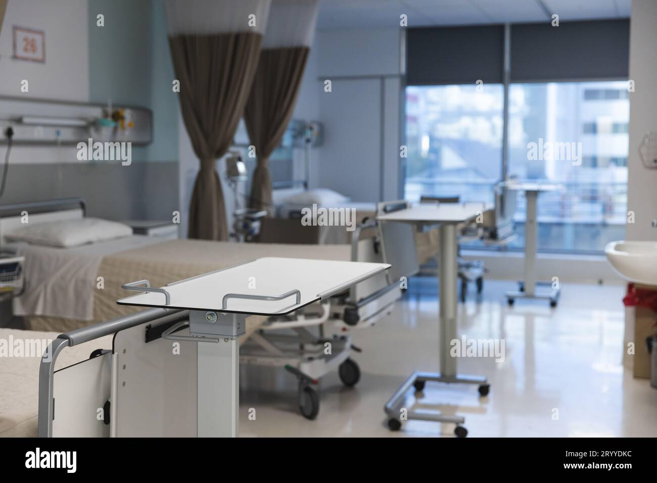 General view of patient room with beds and medical equipment at ...