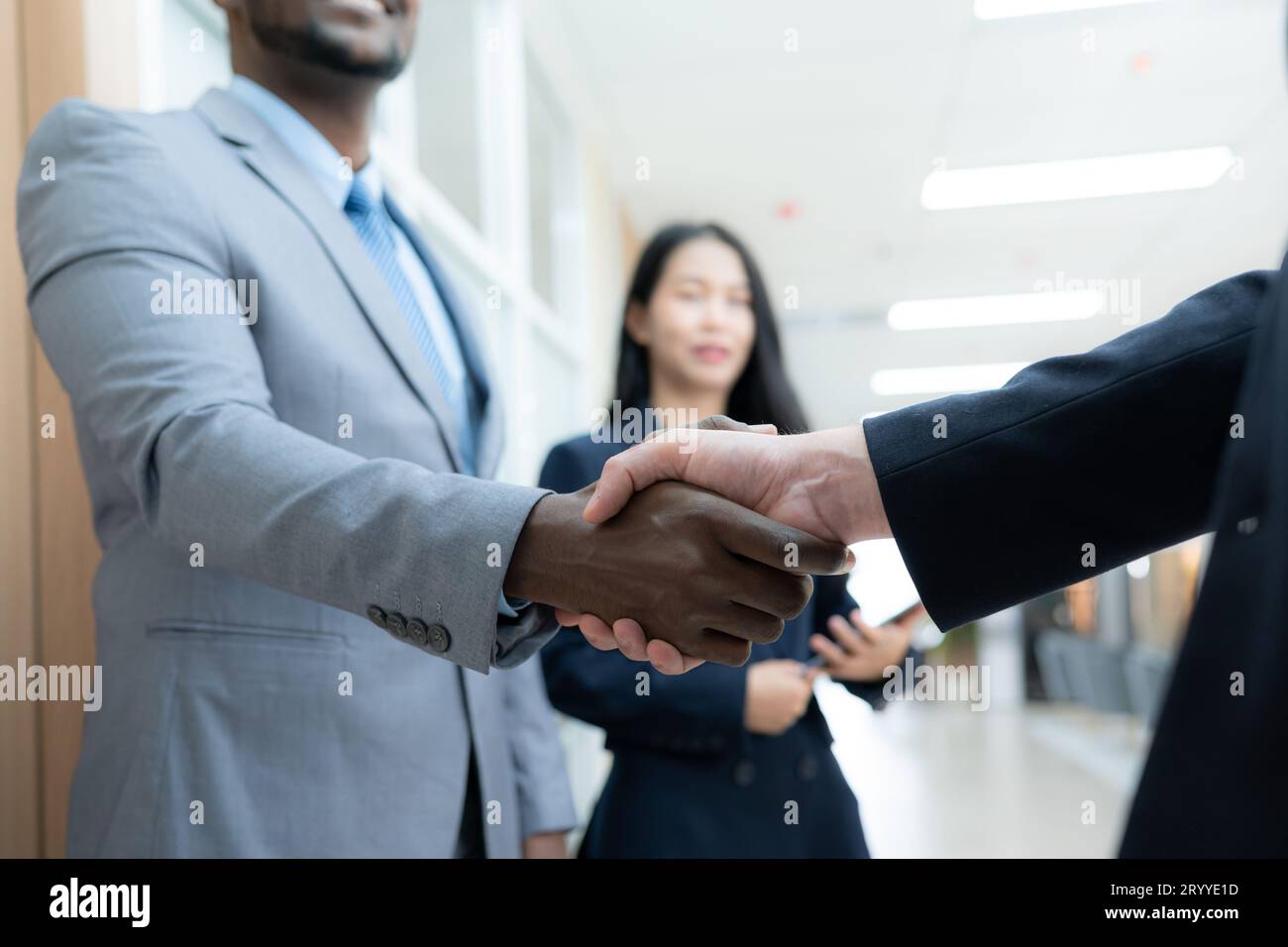 Handshake shows cooperation, achievements, congratulations or even ...