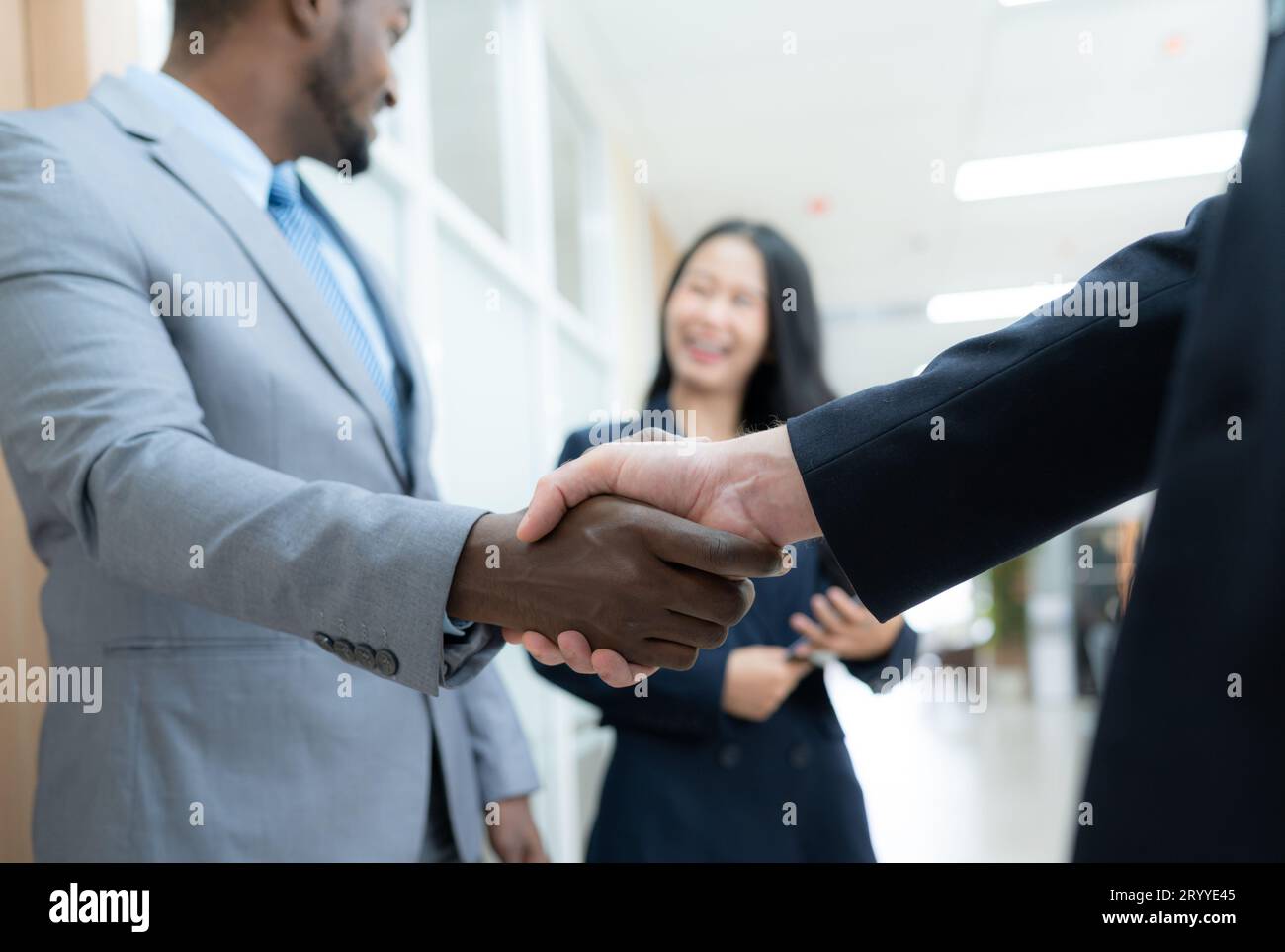 Handshake shows cooperation, achievements, congratulations or even ...