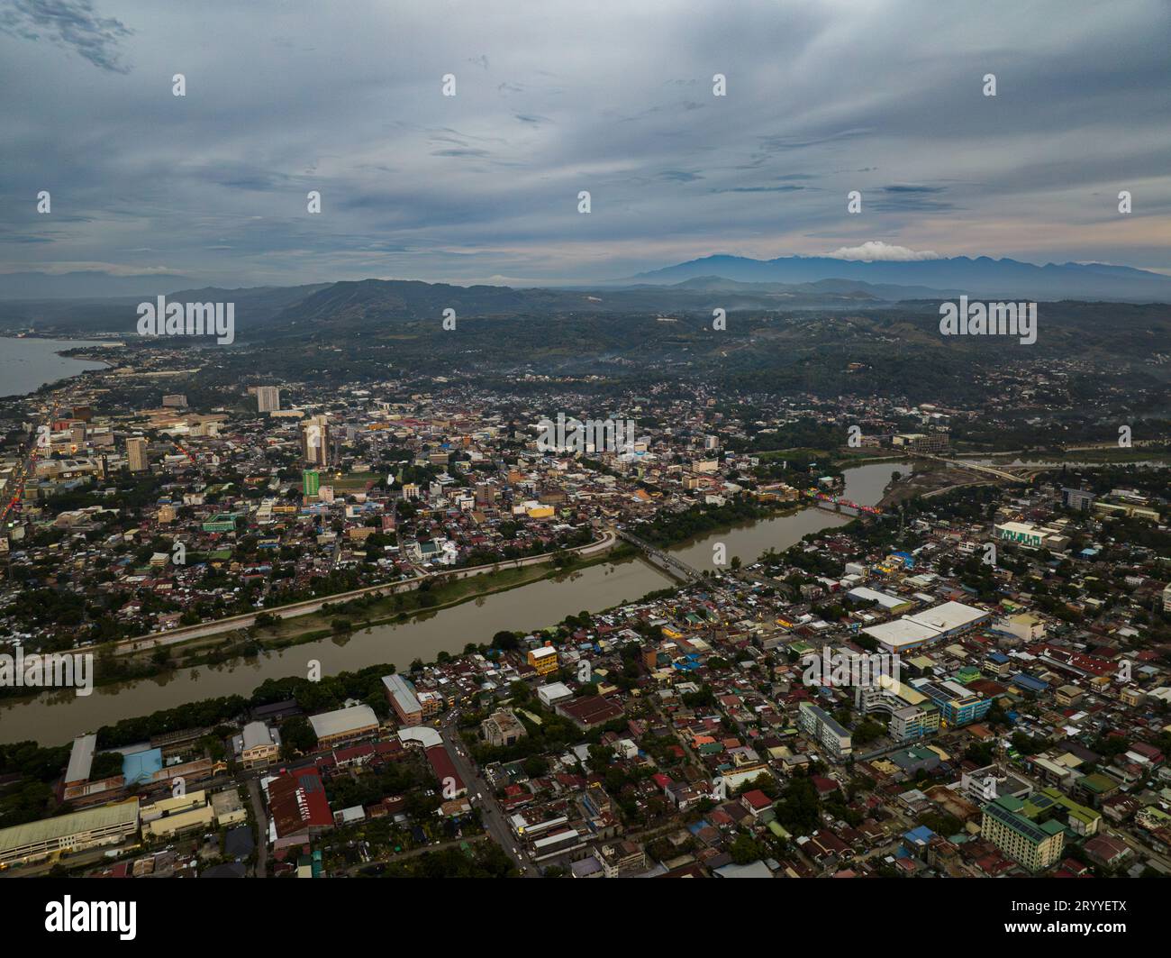 Top view of villages in riverside and highway in Cagayan de Oro ...