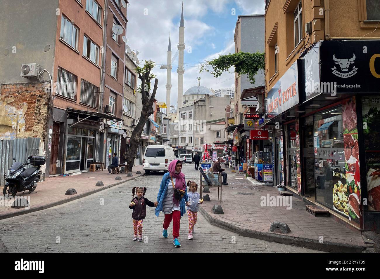 Istanbul, Turkey. 28th May, 2021. A woman walks with her children on ...