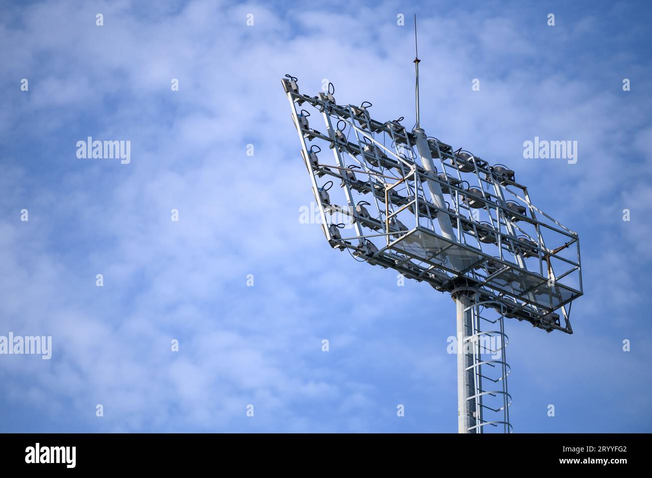 Sport stadium spotlight with blue sky background. Football and soccer ...