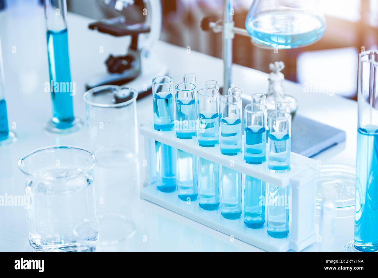 Laboratory test tubes and solution with stethoscope background. Science ...