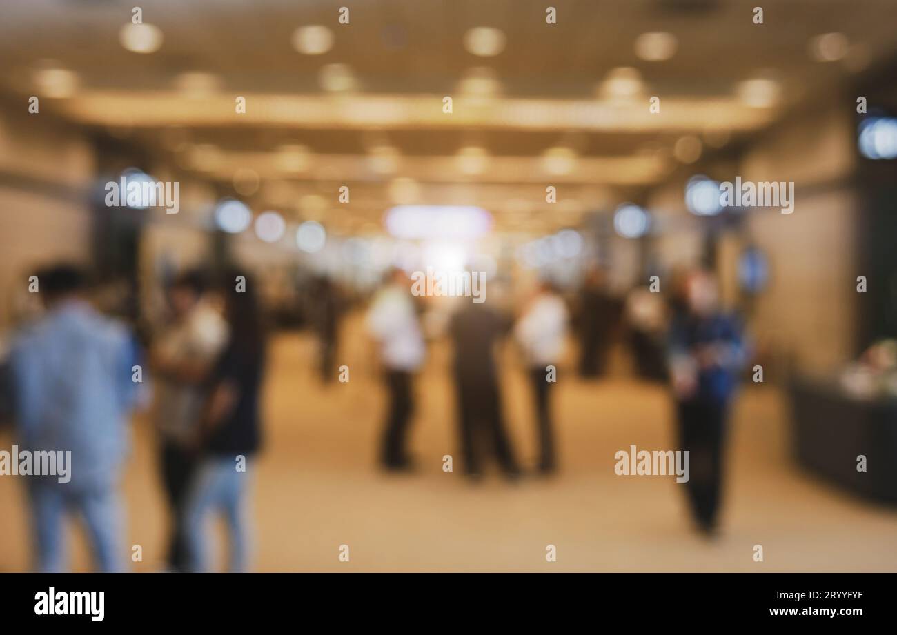 Blurry background of exhibition expo with crowd people in convention ...