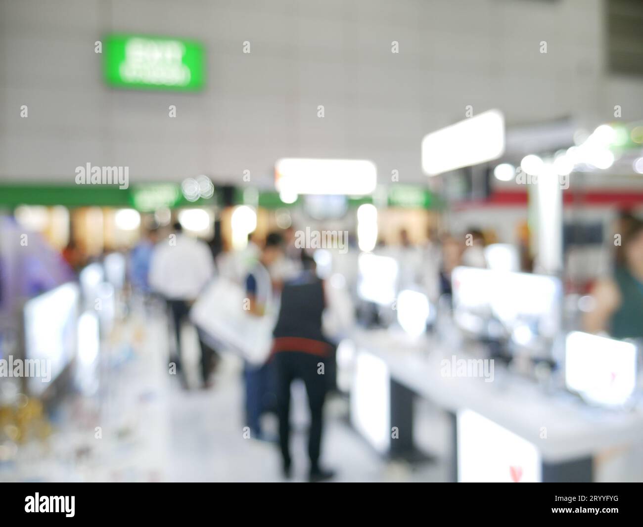 Blurry background of exhibition expo with crowd people in convention ...