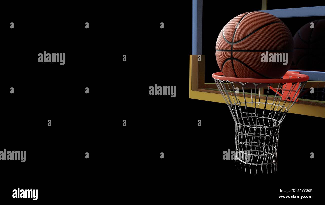 Basketball going into hoop on black isolated background. Sport and ...