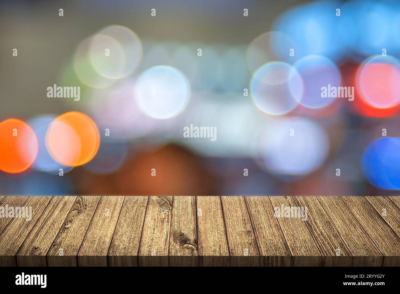 Empty table with colorful bokeh. 3D illustration. City light concept ...