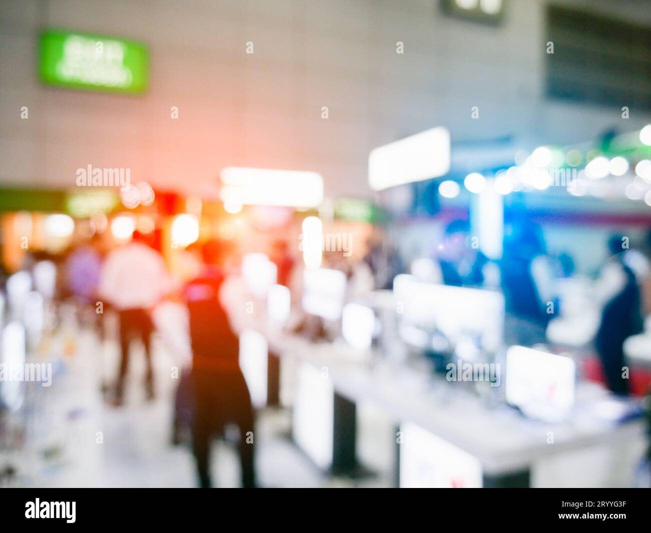 Blurry background of exhibition expo with crowd people in convention ...