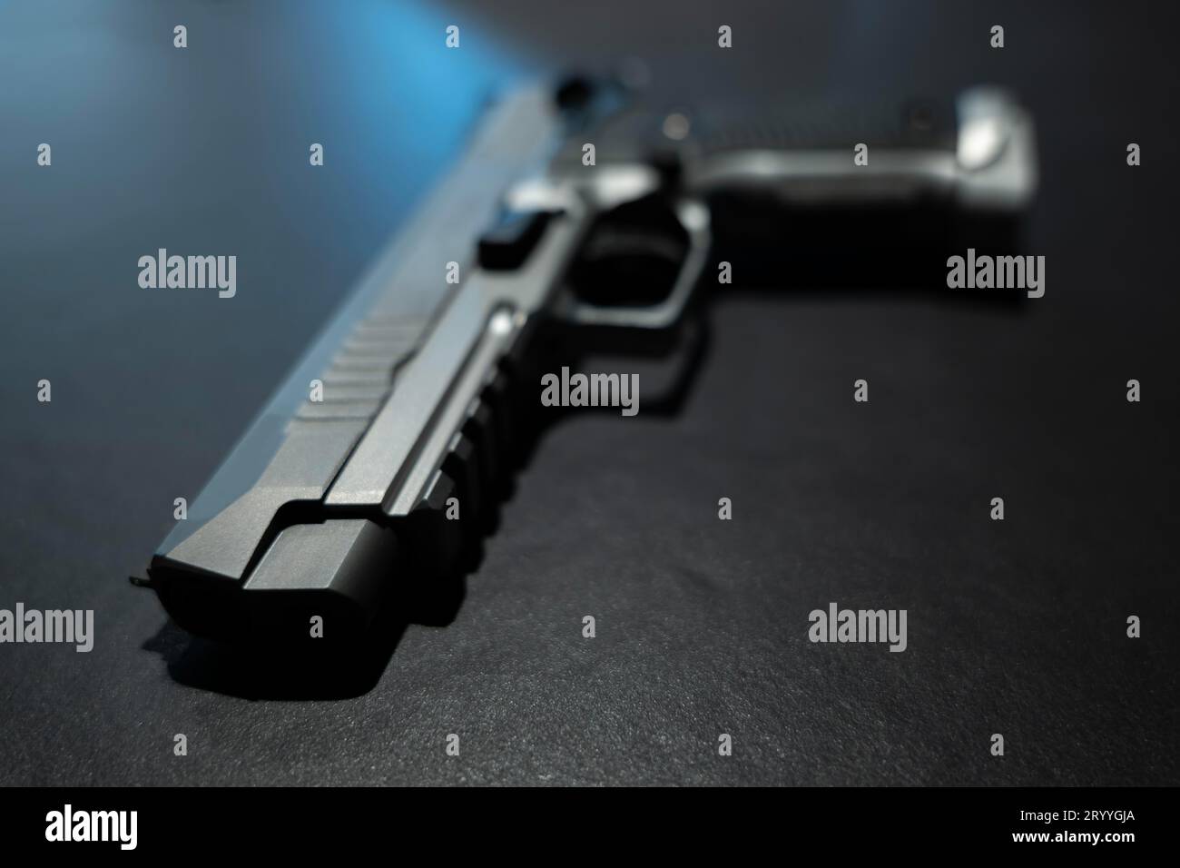 Elegant Chrome Handgun on Gray Granite Background in Switzerland Stock ...