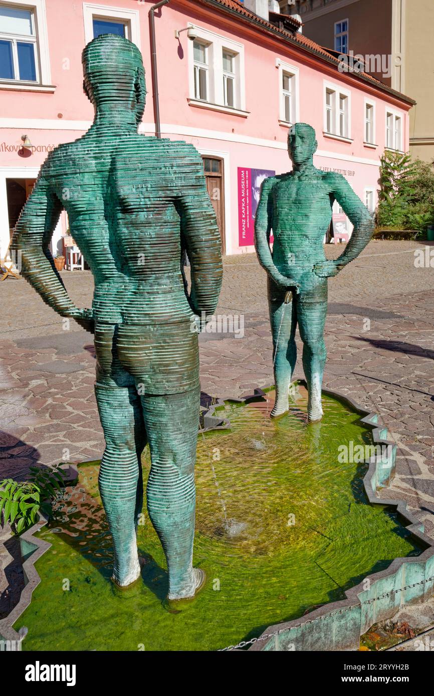 Two male figures peeing, sculpture by the artist David Cerny in front ...