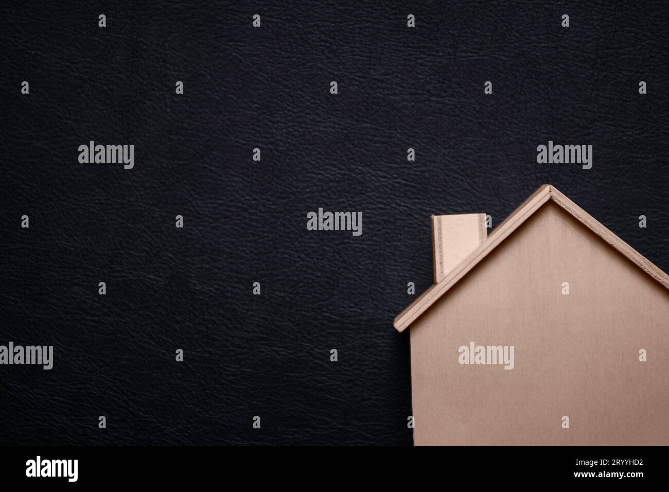 Wooden home with black background. Home sweet home concept. Idea and ...