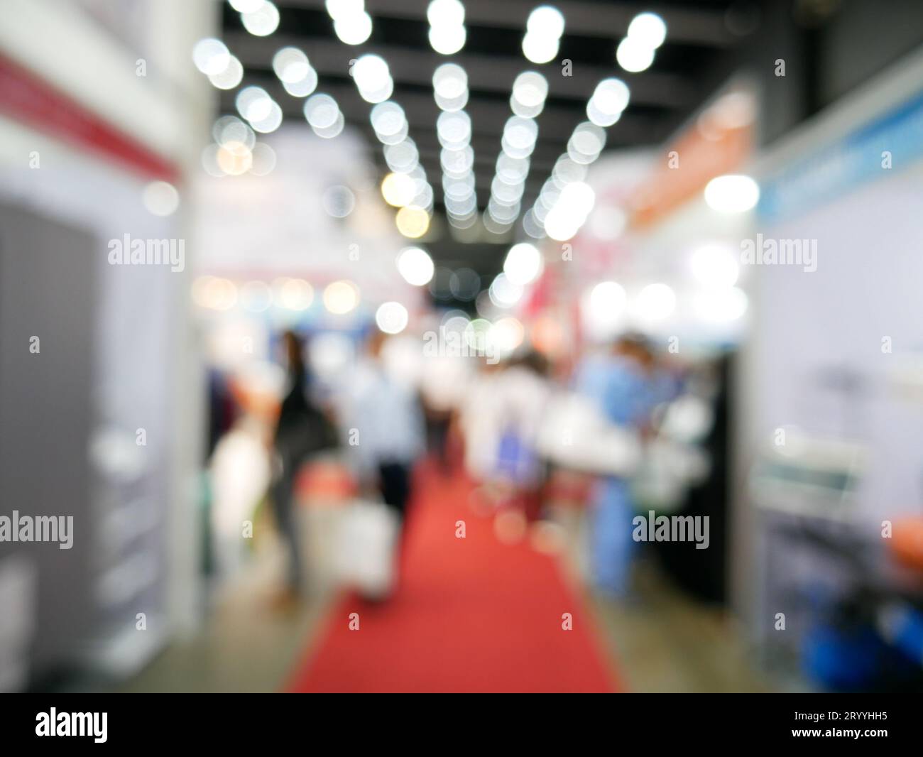 Blurry background of exhibition expo with crowd people in convention ...