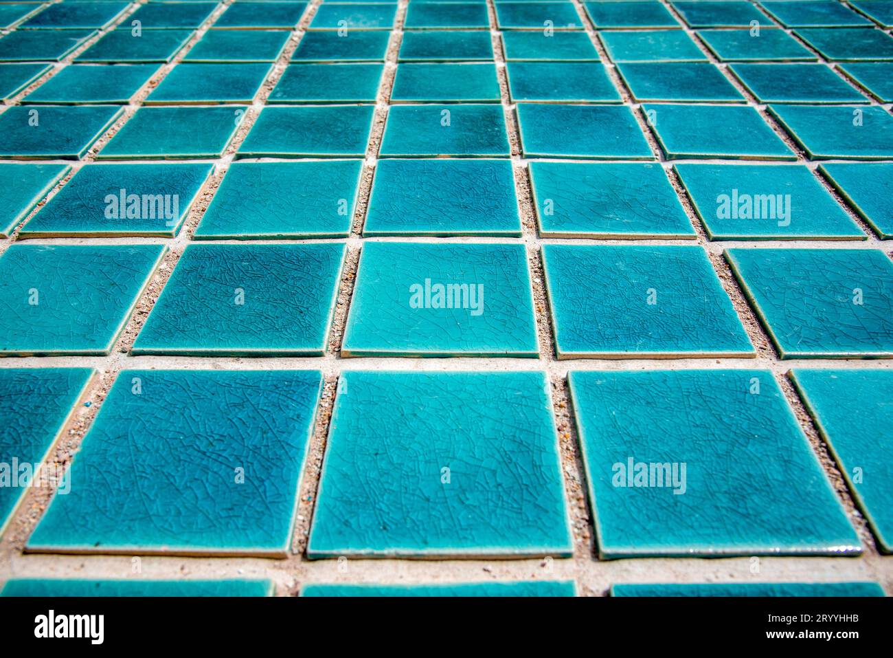 Close up of blue swimming pool tiled floor. Architect and construction ...