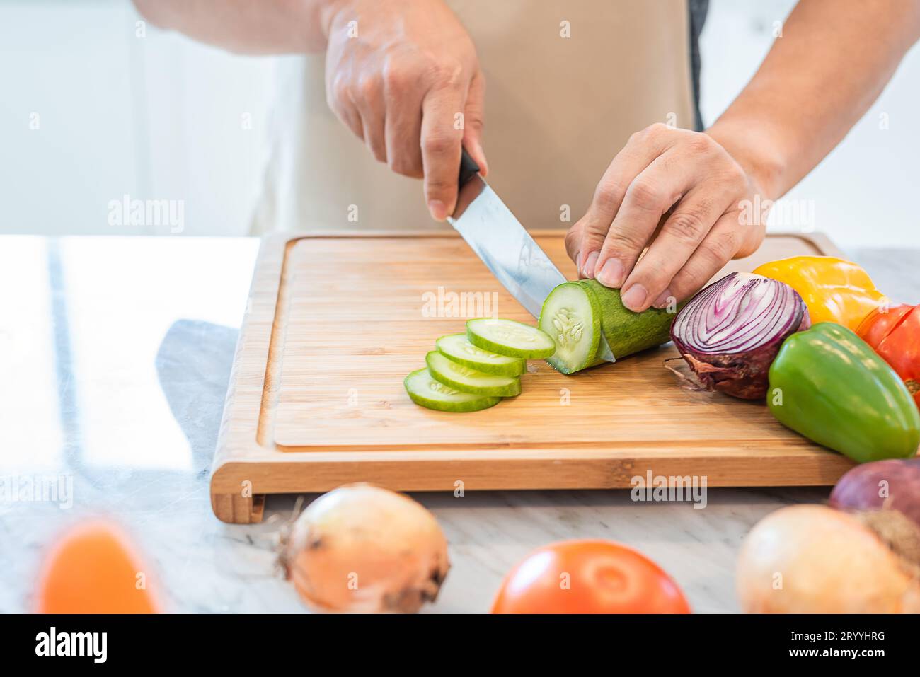 Kitchen hand cooking hi-res stock photography and images - Alamy