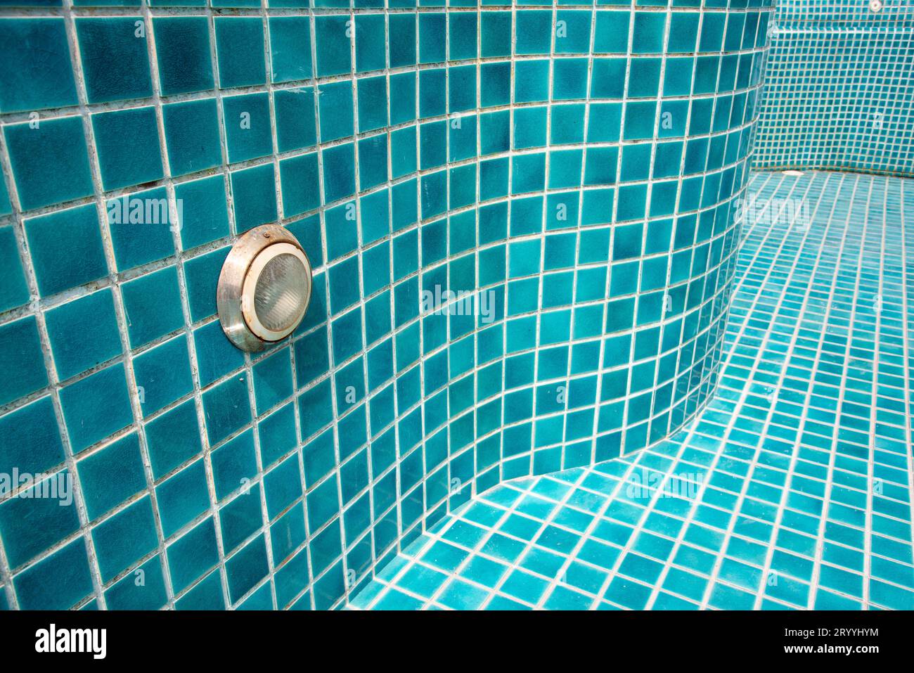 Close up of blue swimming pool tiled floor. Architect and construction ...