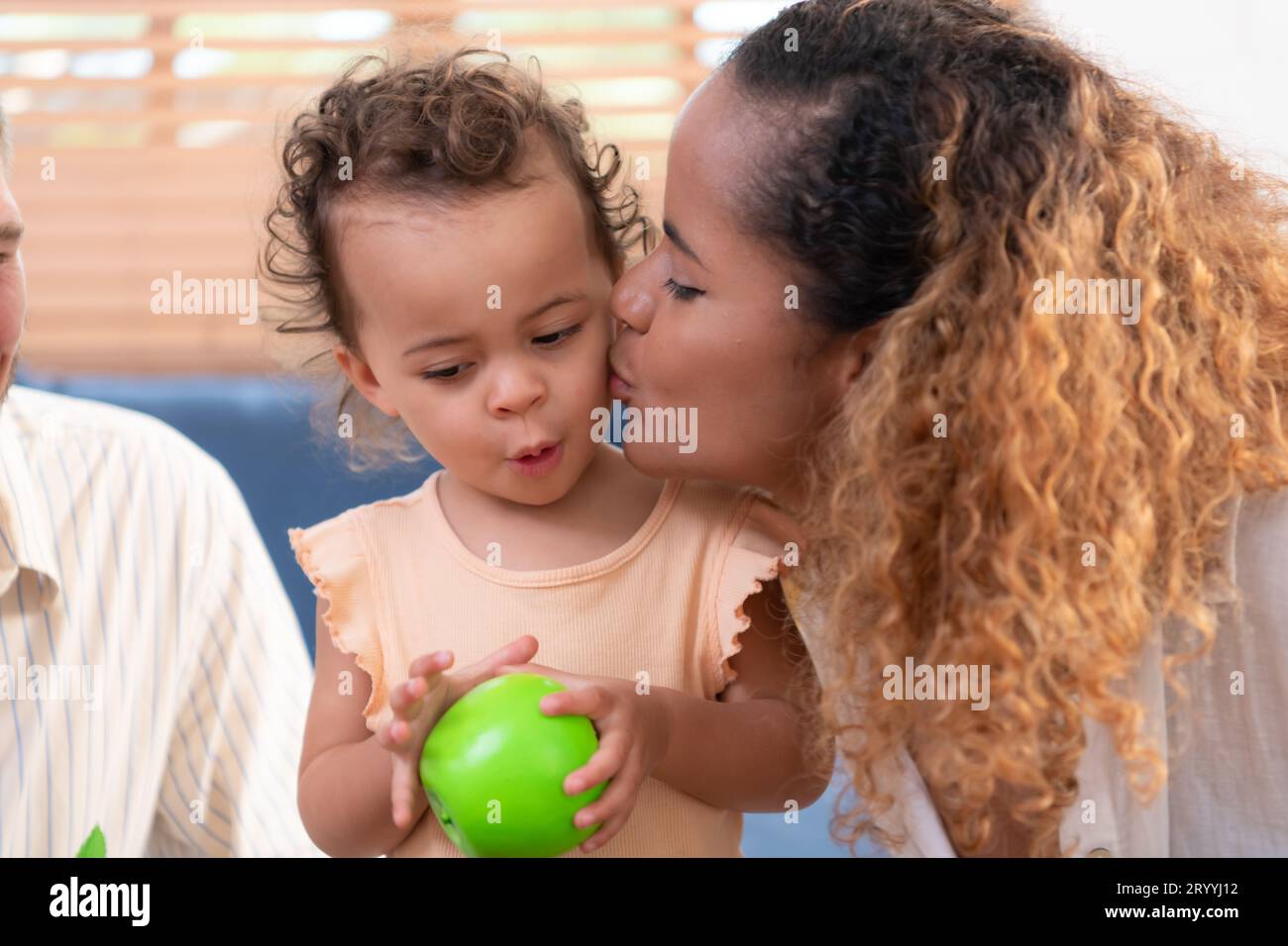 Parents and children relax in the living room of the house. Watch baby ...