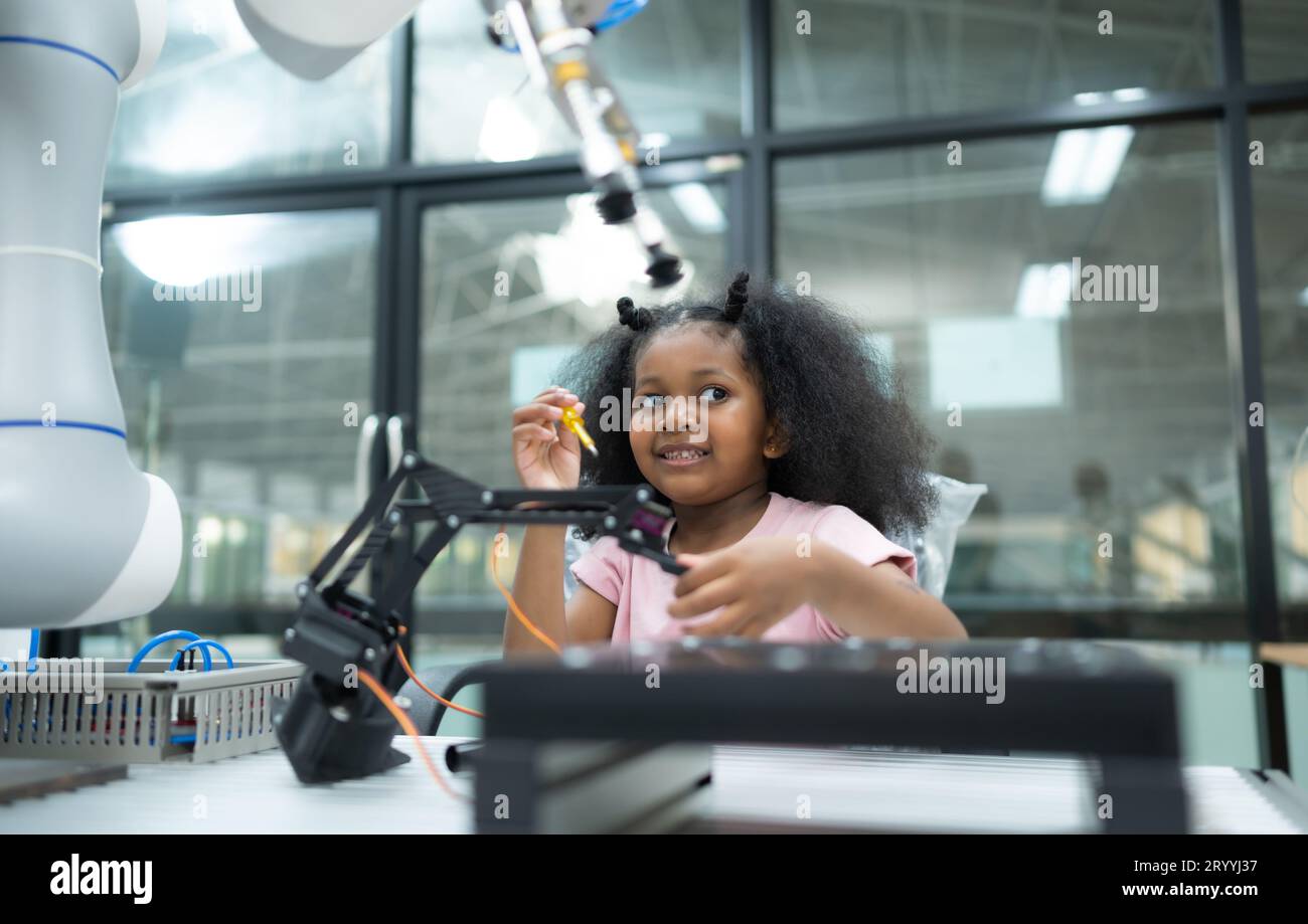 Youngsters utilizing the hand robot technology are having fun learning the electronic circuit ...