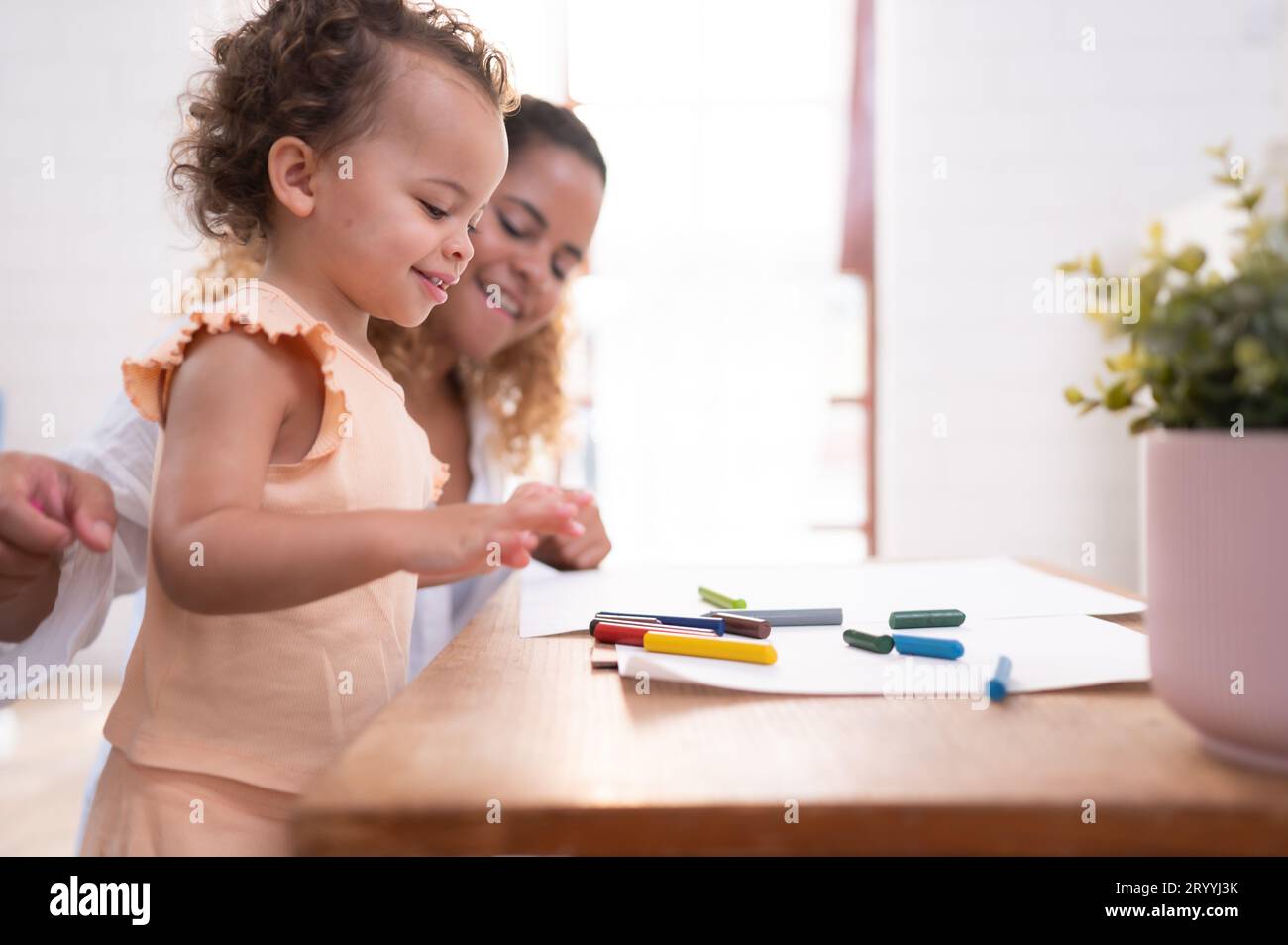 A little child's imagination is represented through colored pencil ...