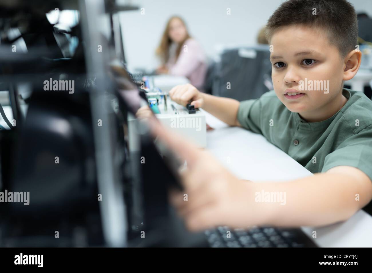 Youngsters utilizing the hand robot technology are having fun learning ...