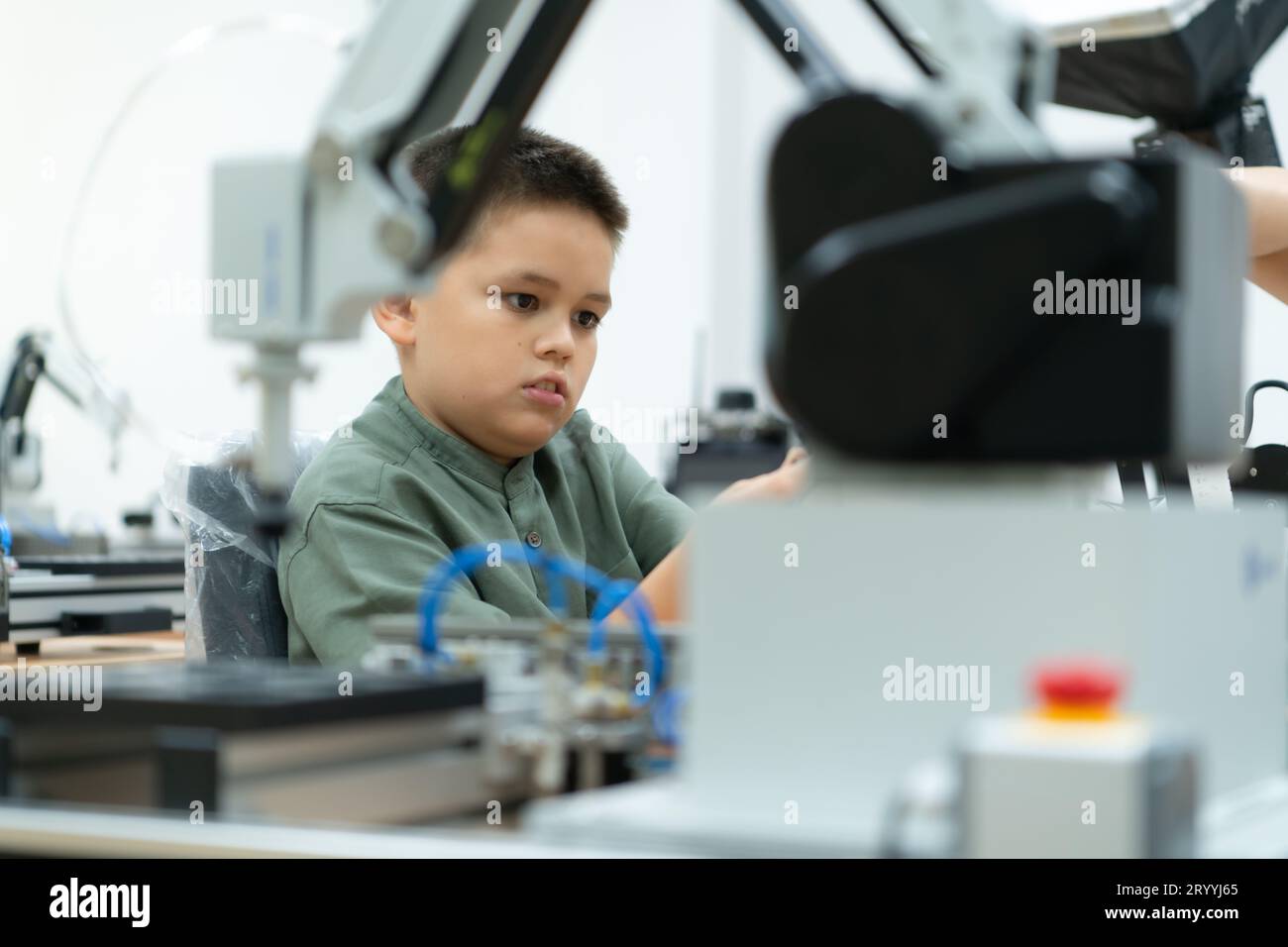 Children using the hand robot technology, Students are studying ...
