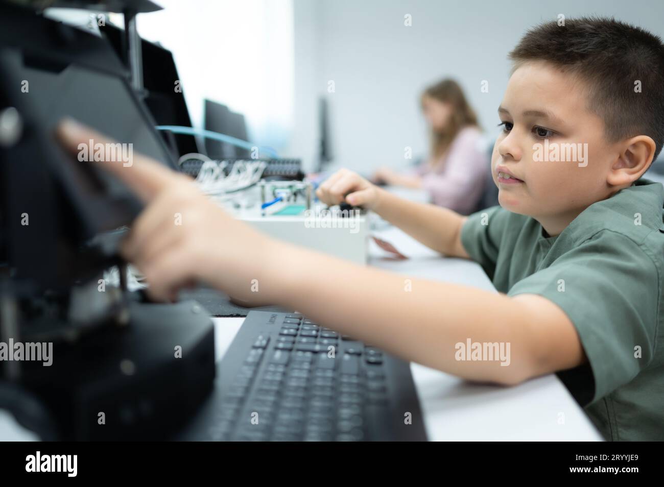 Youngsters utilizing the hand robot technology are having fun learning ...