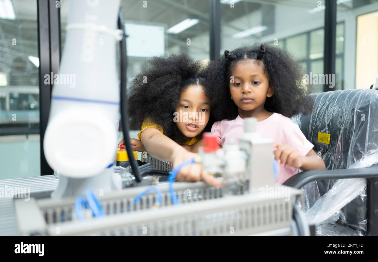 Children using the hand robot technology, Students are studying ...