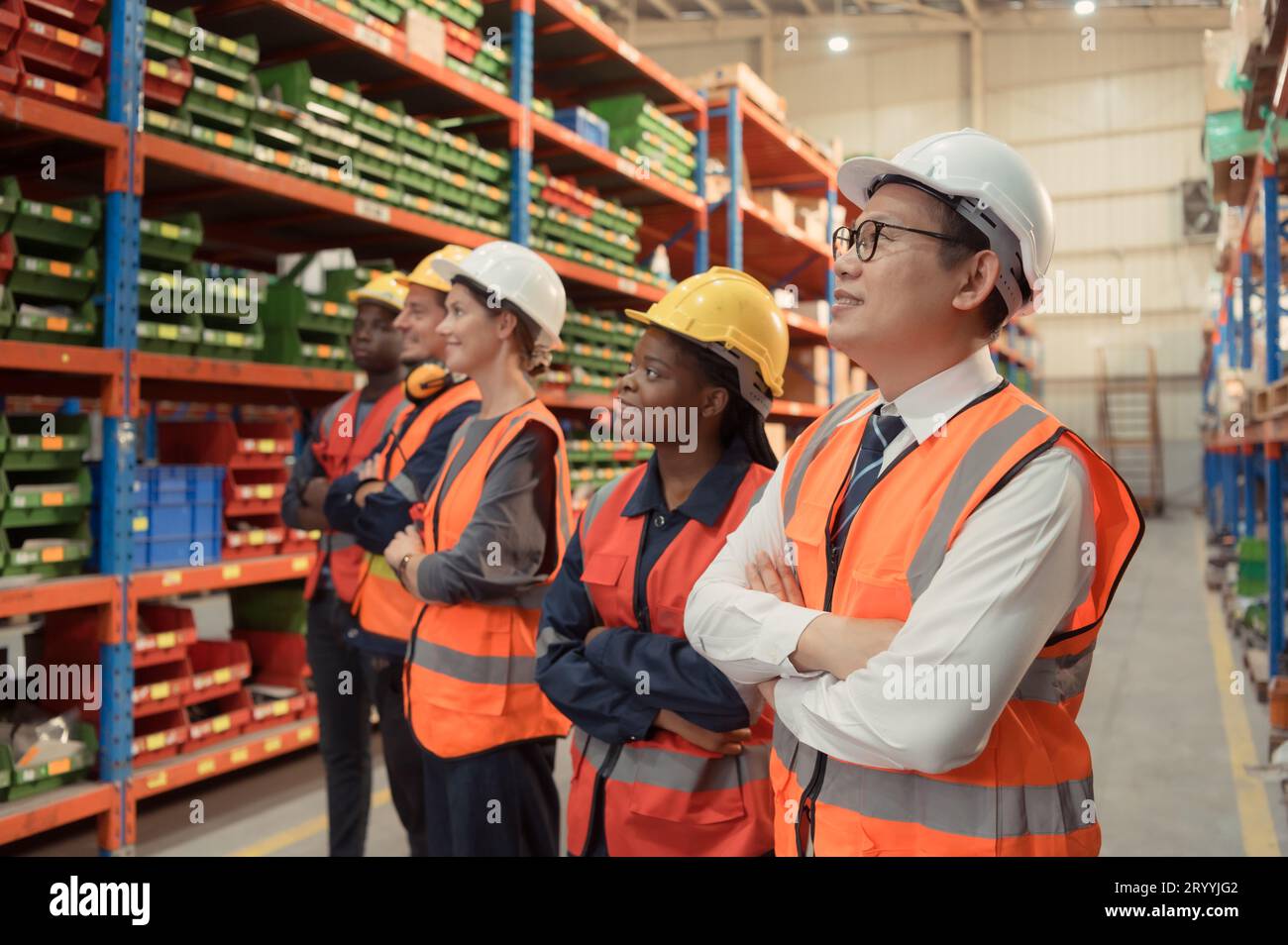 Portrait of Group employees in a warehouse, Consisting of Warehouse ...