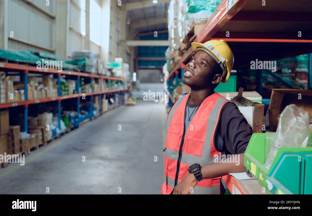 Portrait of warehouse workers in a large warehouse with their own ...
