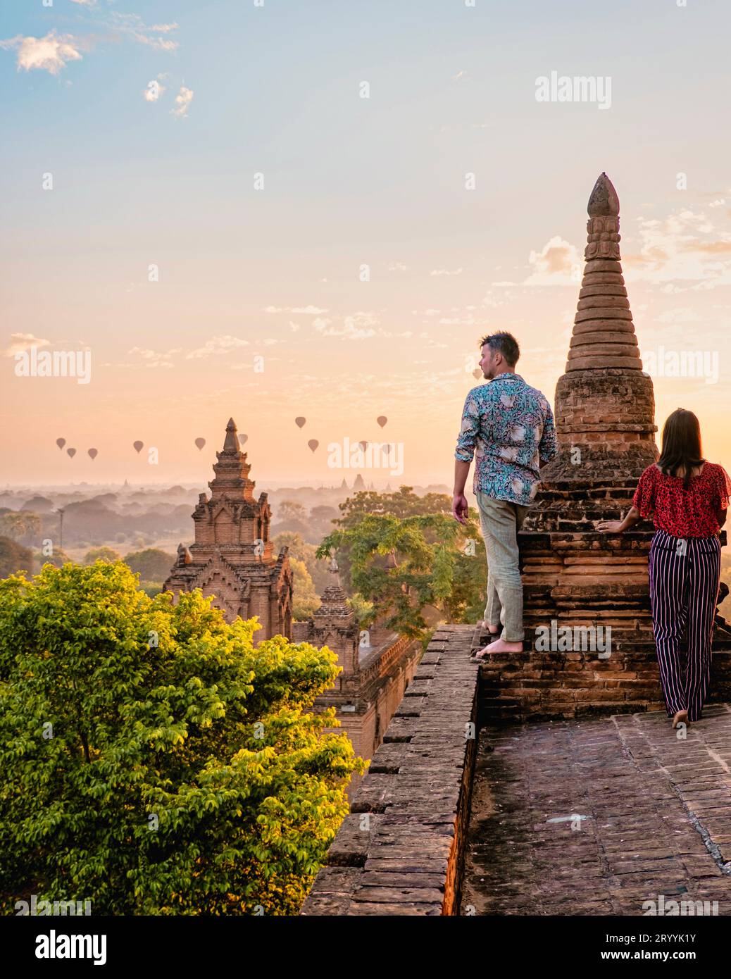 Bagan Myanmar, hot air balloon during Sunrise above temples and pagodas ...
