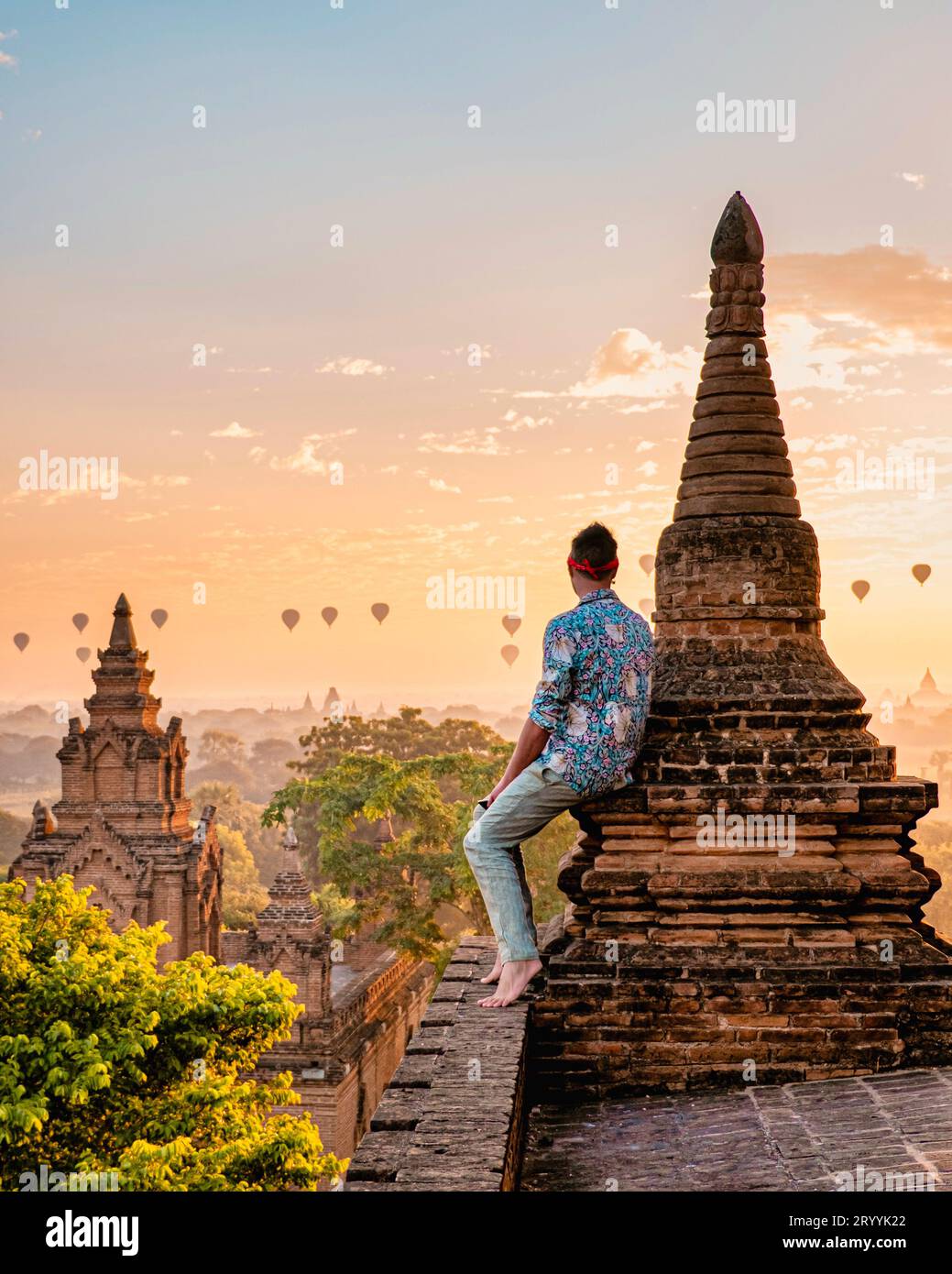 Bagan Myanmar, hot air balloon during Sunrise above temples and pagodas ...