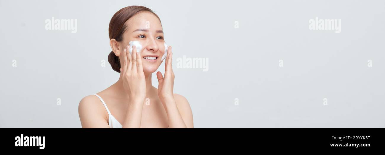 banner of Soap face woman clean skin care beauty Stock Photo - Alamy