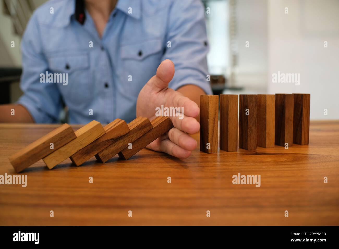 Planning risk and strategy in businessman gambling placing wooden block ...