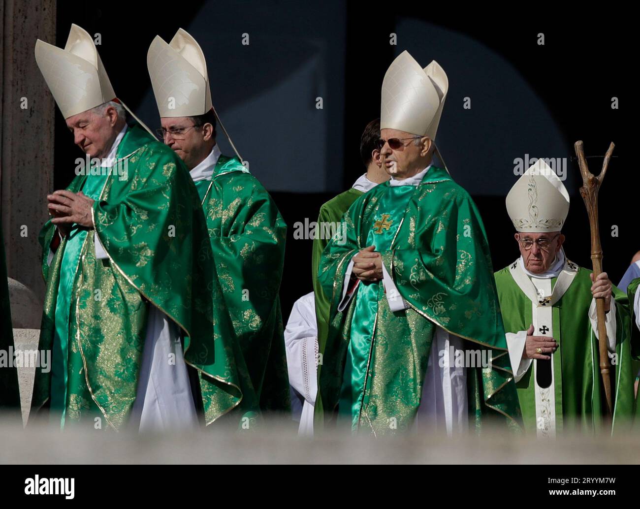 FILE - Pope Francis, bottom right, arrives to celebrate a Mass for the ...