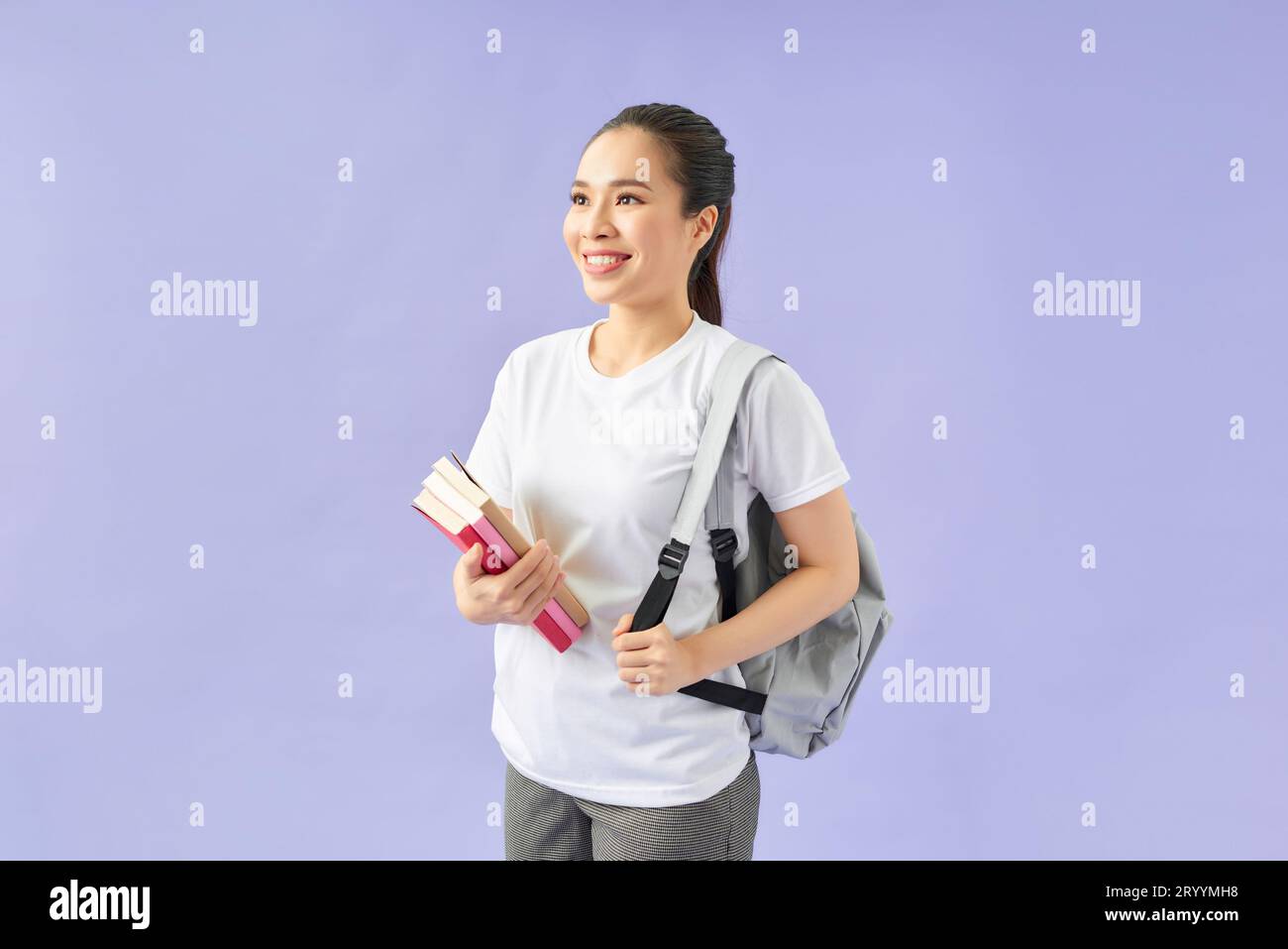 Young smiling happy girl student wear backpack hold books isolated on ...