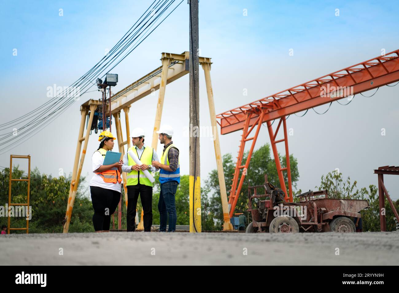 Group of architects, construction foremen, and construction engineers ...