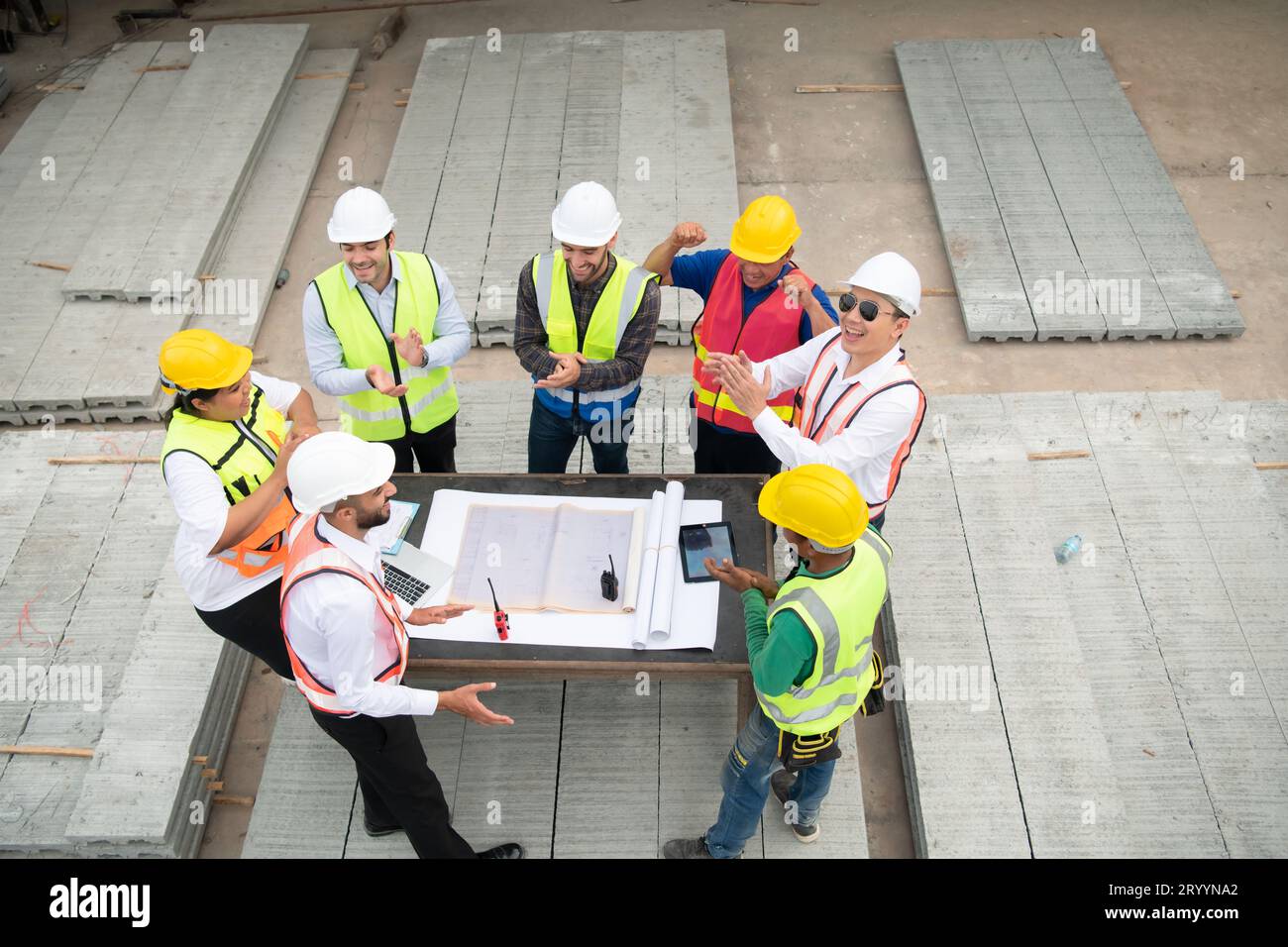 Construction engineers, architects, and foremen form a group ...