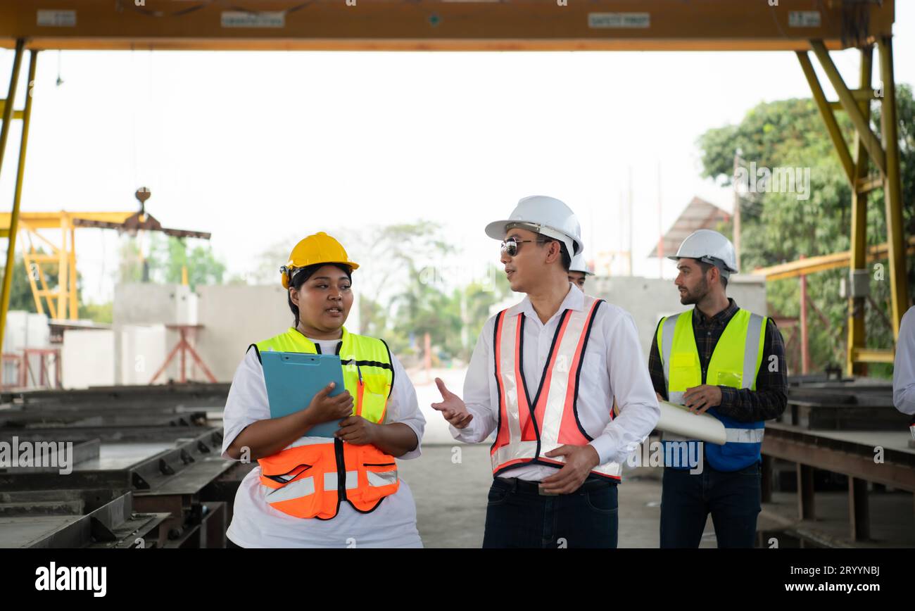 Group of architects, construction foremen, and construction engineers ...