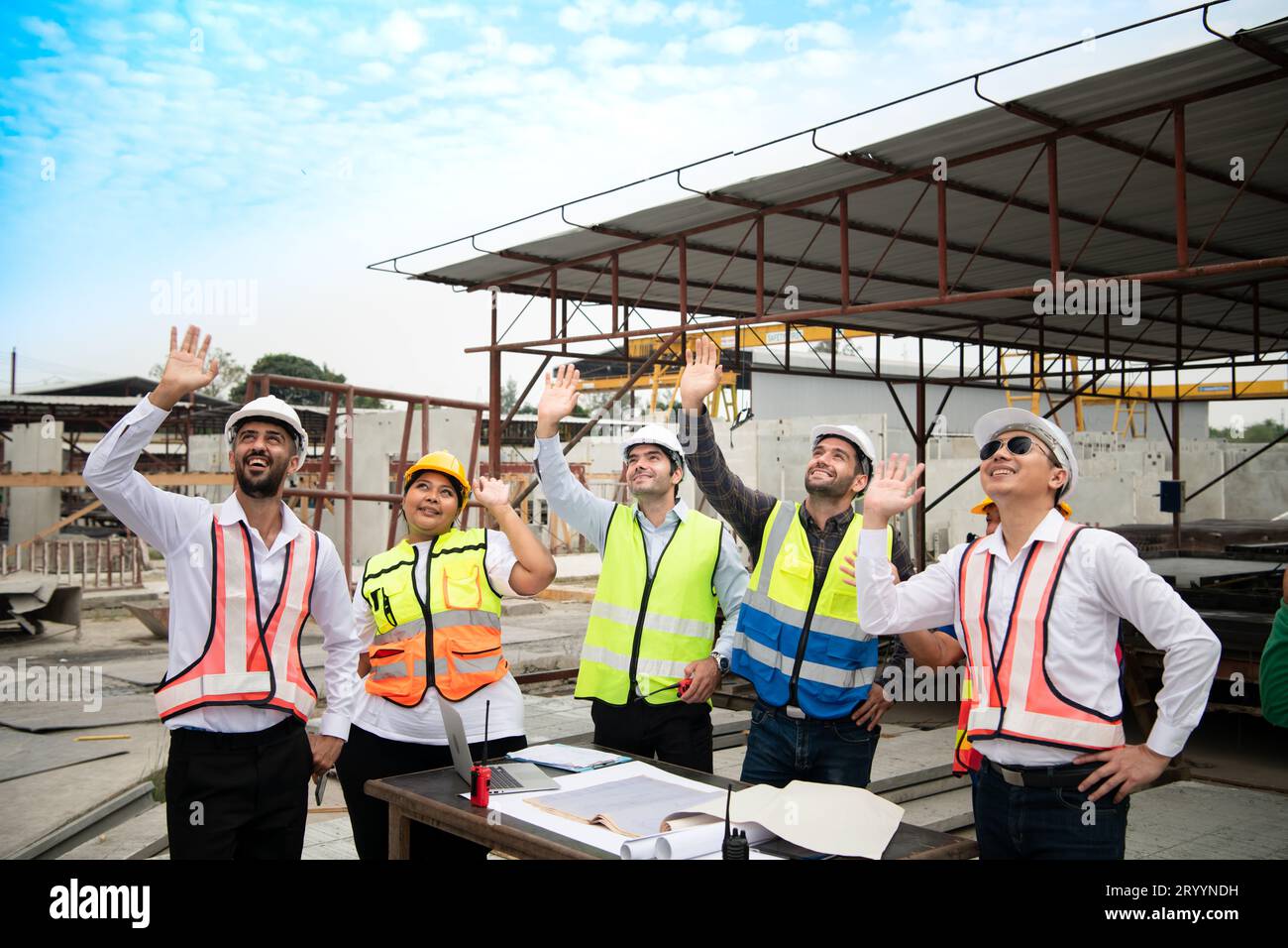 Construction manager with new building hi-res stock photography and ...