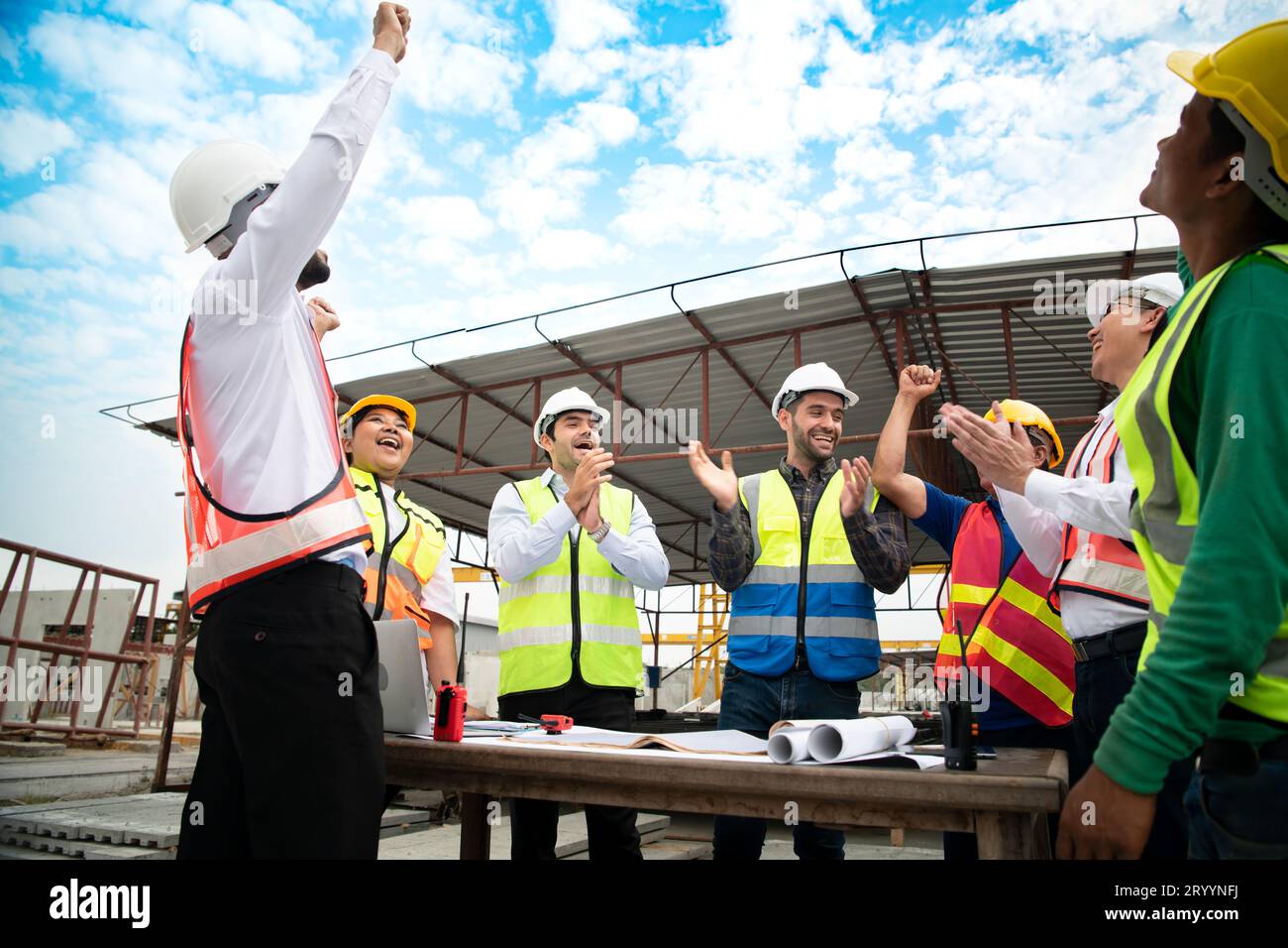 Construction engineers, architects, and foremen form a group ...