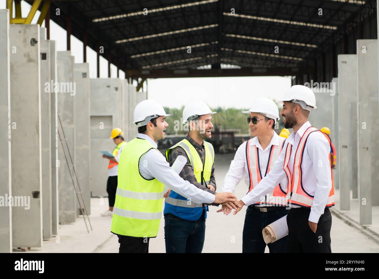 Construction engineers, architects, and foremen form a group ...