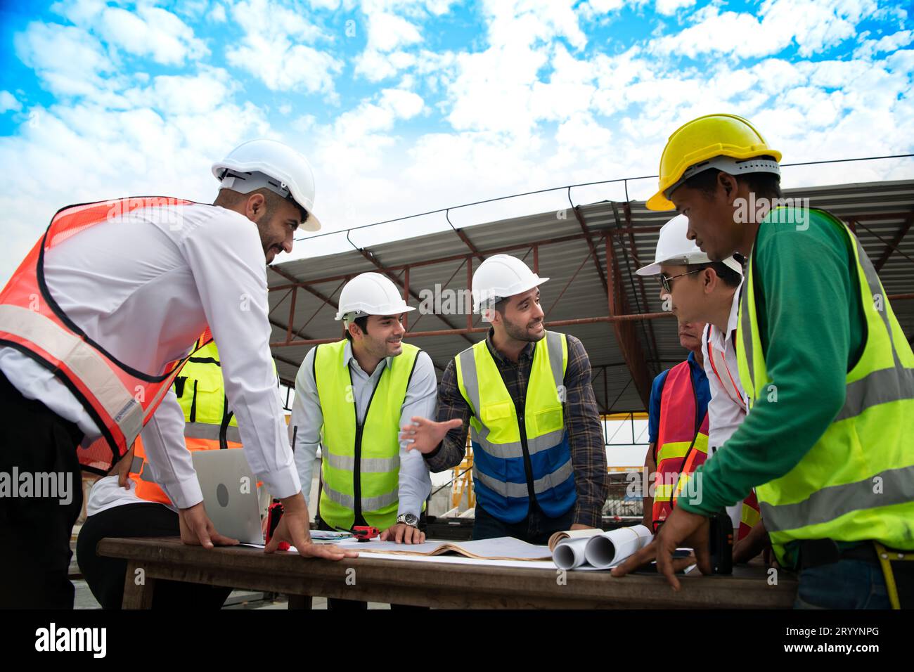 Construction engineers, architects, and foremen form a group ...