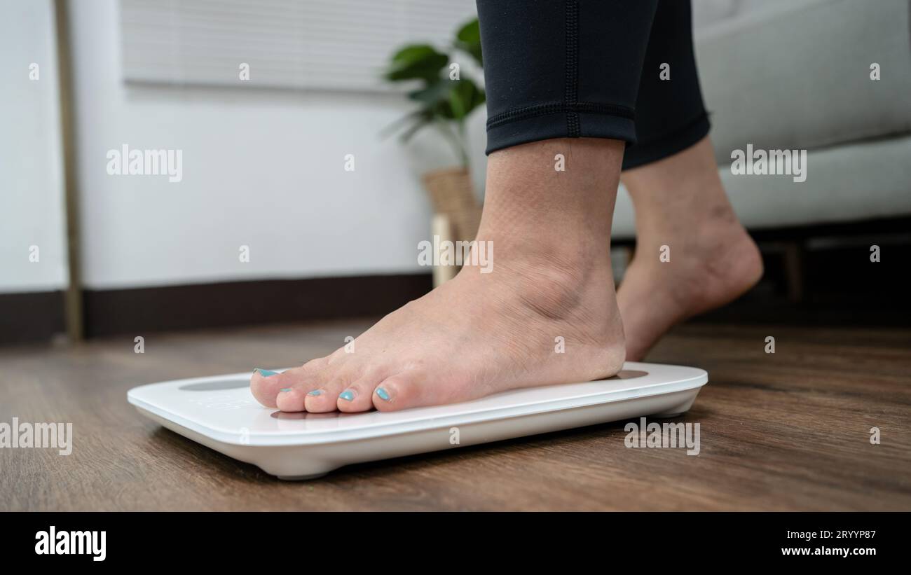 Female feet on a scale hi-res stock photography and images - Alamy