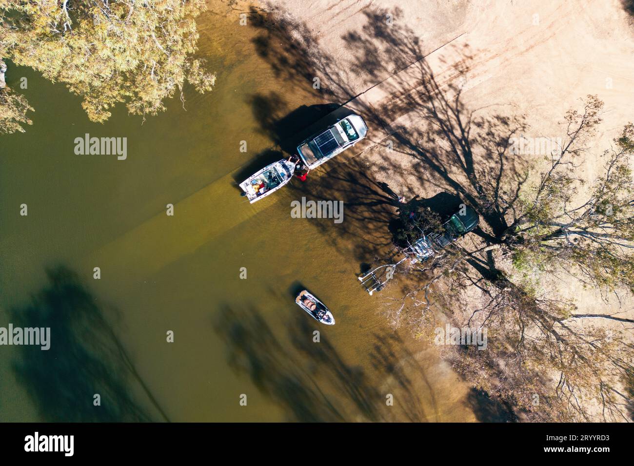 An aerial view of a boat ramp on Lake Eildon where boaters are ...
