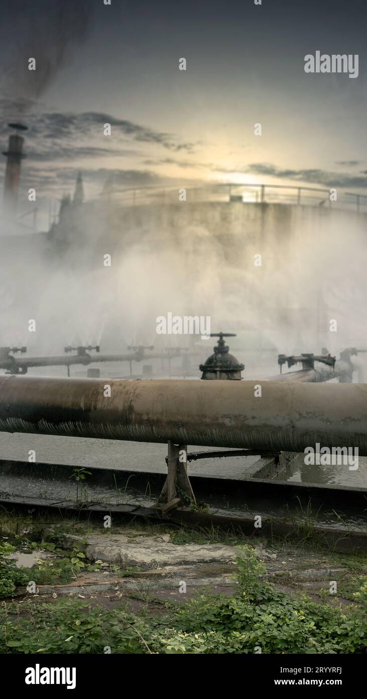 Haunted factory building in the afternoon. Scary Halloween background ...