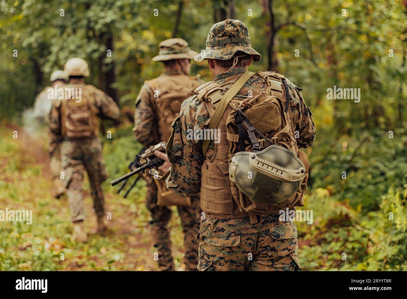 Modern warfare Soldiers Squad Running as Team in Battle Formation Stock ...